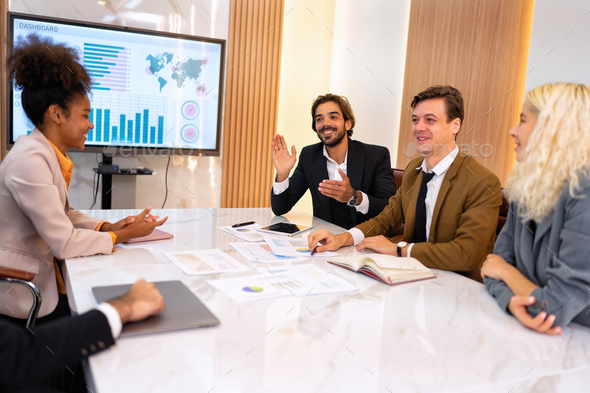 Employee on job corporate Business colleagues sit around table clapping ...
