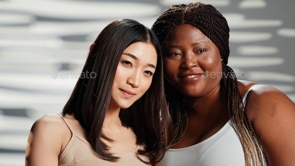 Women with different body types posing in studio Stock Photo by DC_Studio