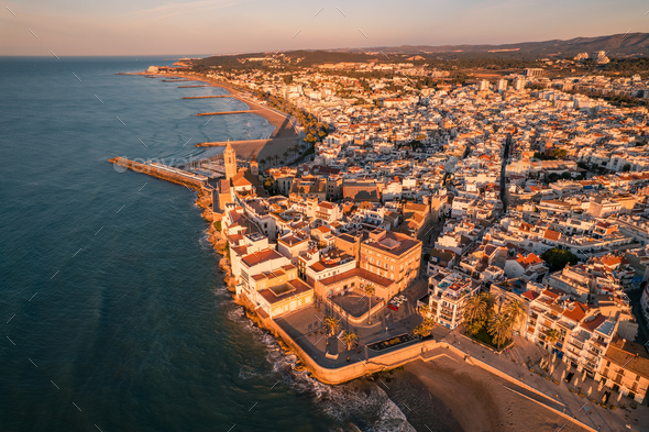 Aerial view of Sitges coastal village and Iglesia de San Bartolomé y ...
