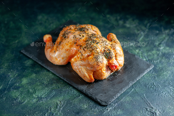 front view cooked spiced chicken on dark background meat food barbecue ...