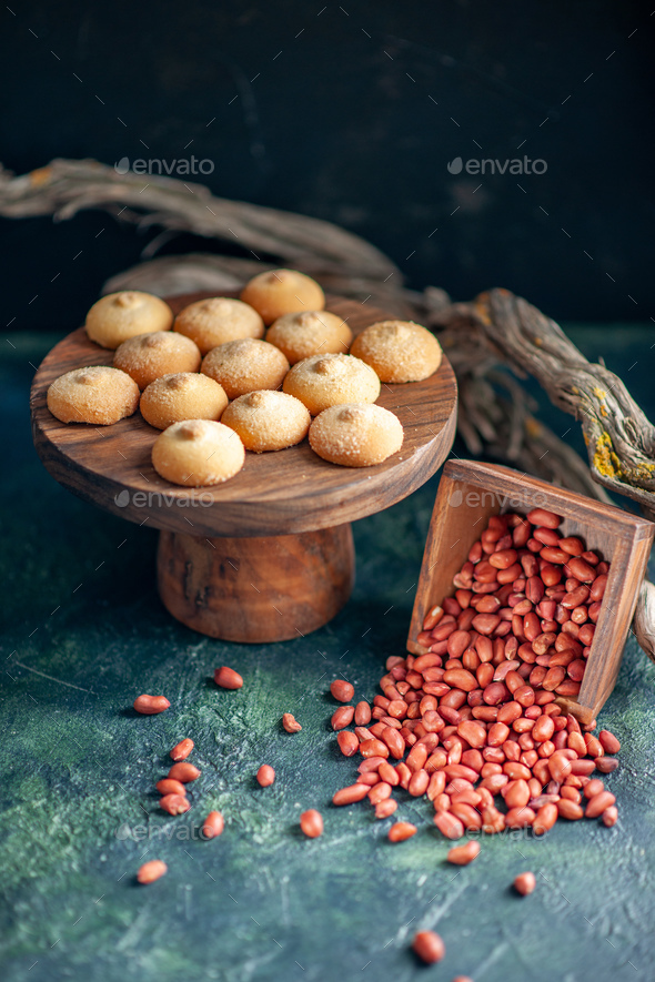 front view delicious biscuits on dark blue background cookies biscuit ...