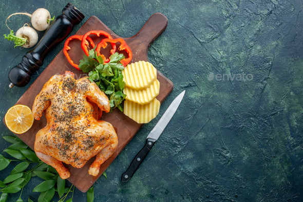 top view cooked chicken spiced up with potatoes on dark background meat ...