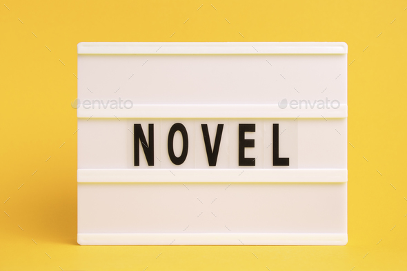 The word novel on lightbox isolated yellow background. Literary Genres ...