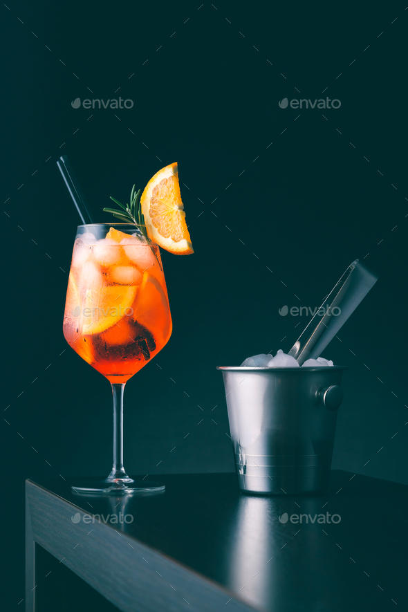 Aperol Spritz cocktail and bucket of ice Stock Photo by vladans | PhotoDune