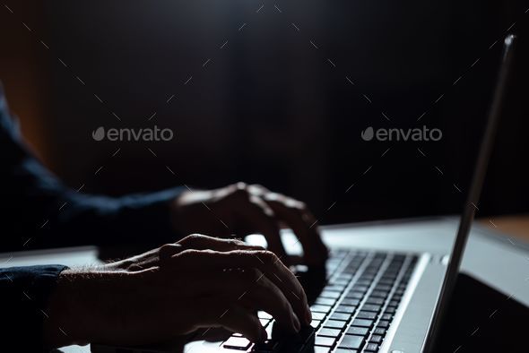 Businessman Typing Recent Updates On Lap Top Keyboard On Desk ...