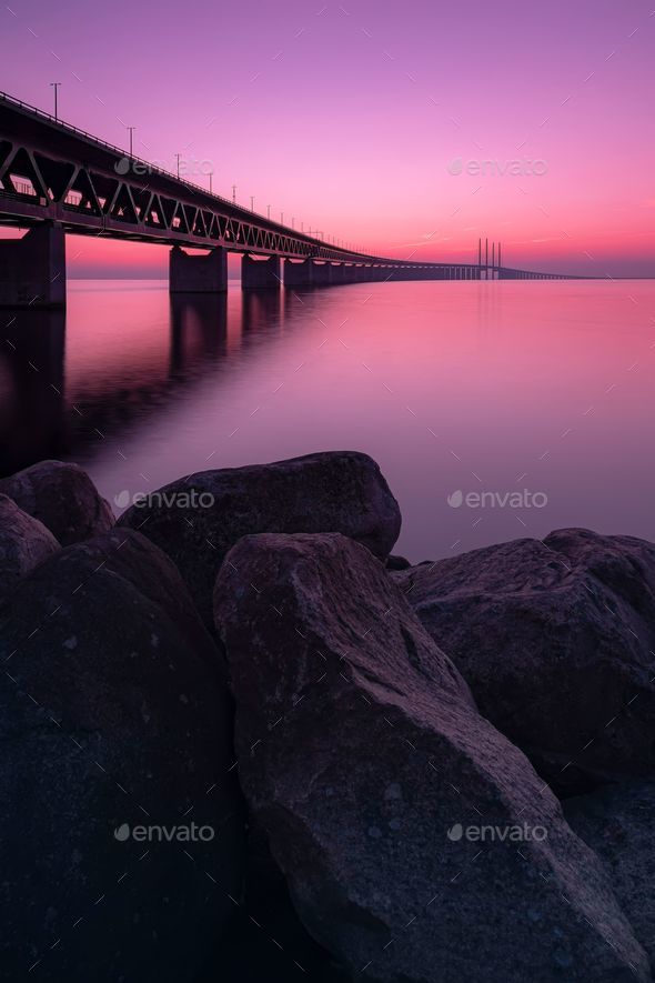 Vertical pink sunset view from the Malmo coast -The Oresund Bridge ...