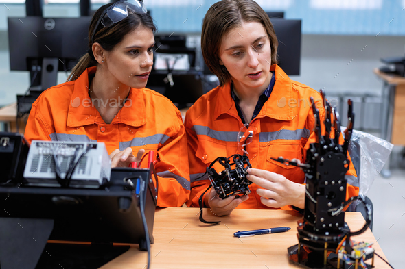 Girl engineer in robot industry fabrication research room simulate ...