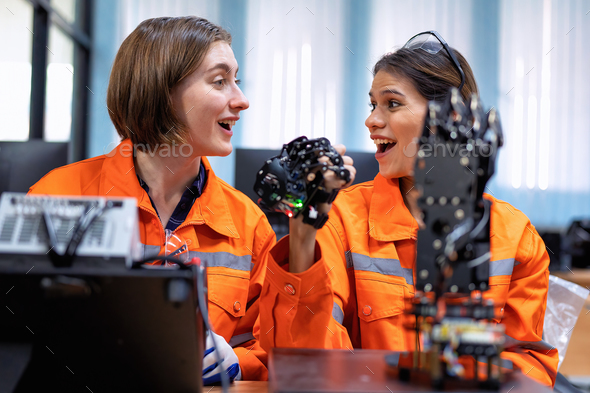 Girl engineer in robot industry fabrication research room simulate ...