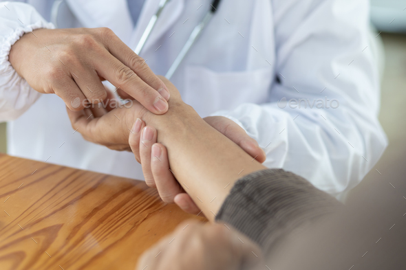 Close-up, the doctor is doing a basic health check and measuring his ...