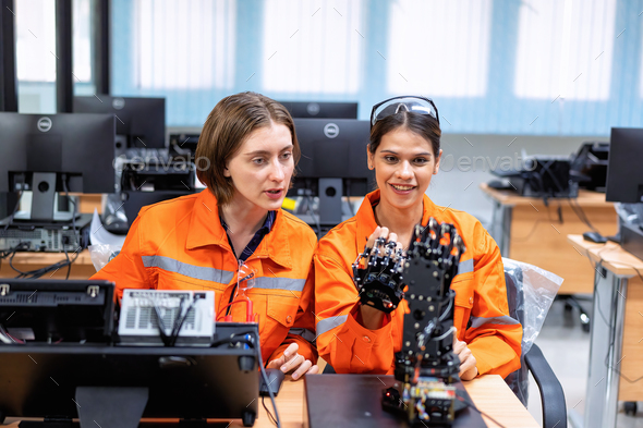 Girl engineer in robot industry fabrication research room simulate ...