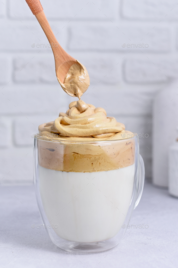 Dalgona coffee or whipped instant coffee on light background. Stock ...