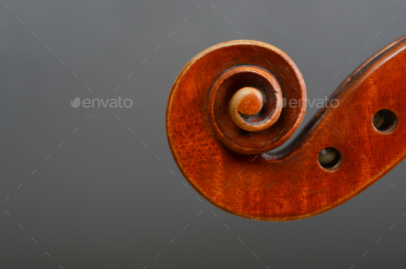 Beautiful aesthetic carving violin scroll Stock Photo by wirestock