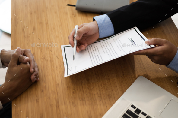 Signing a legal contract agreement. Stock Photo by wasant1 | PhotoDune