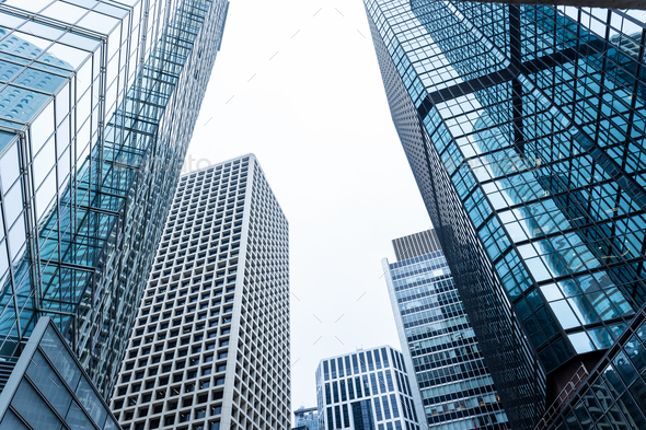 Bottom view of the office tower skyscraper Stock Photo by leungchopan