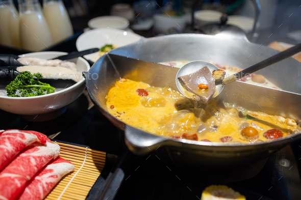 Taiwanese hot pot in restaurant with spicy duck blood Stock Photo by ...