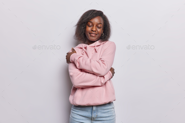 Good Feelings And Self Love Concept Pleased Curly Haired Afro American