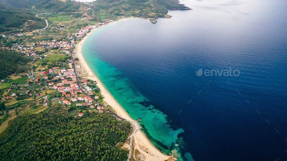 Aerial view of the coastal village and Toroni beach in Sithonia ...