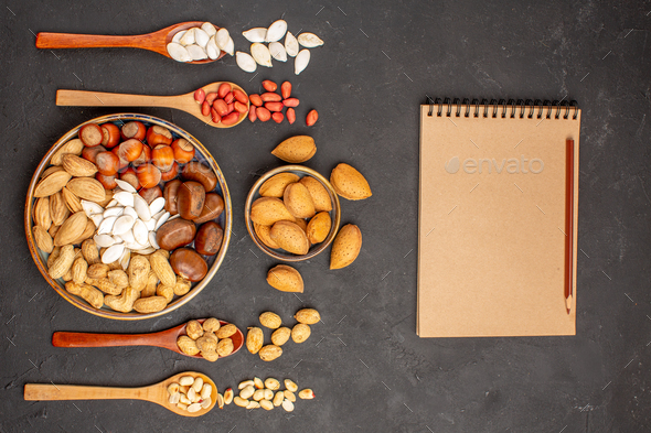 top view nut composition different nuts on dark grey background walnut ...