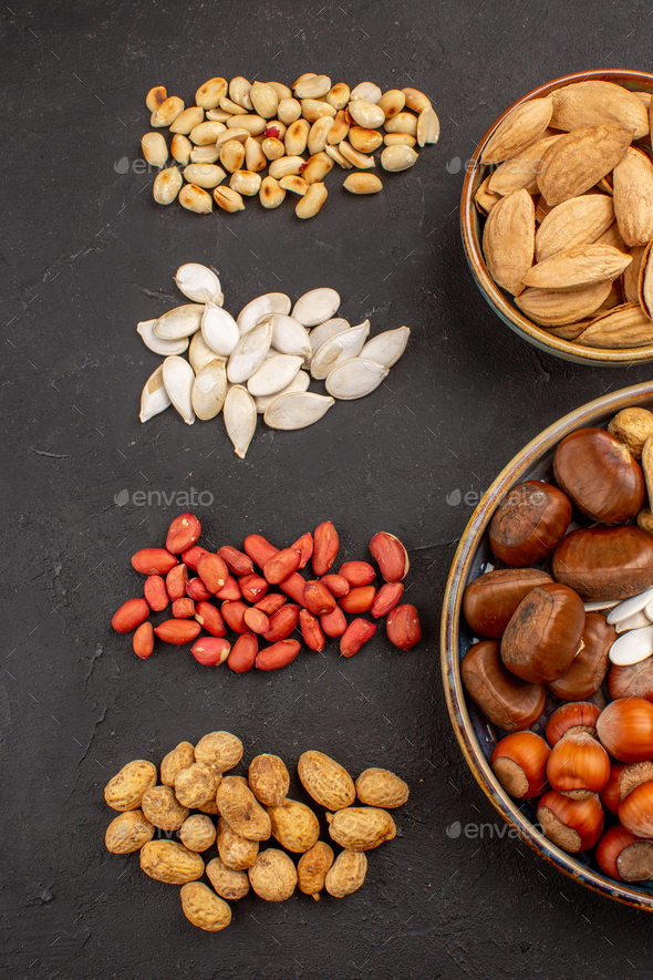 top view nut composition different fresh nuts on a dark background nut ...