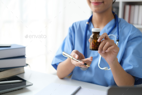 Young professional female doctor explaining the instruction of the ...