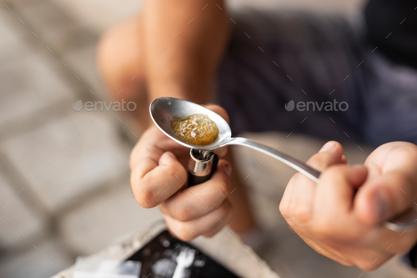 Drug addict cooking heroin Stock Photo by Impactphotography | PhotoDune