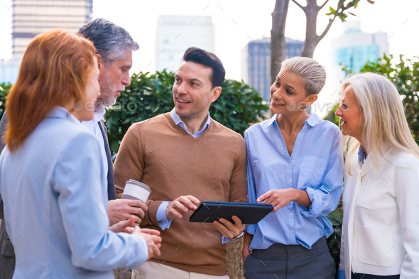 Cheerful Portrait of a happy group of co-workers laughing and having ...