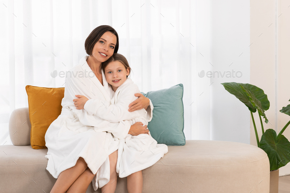Portrait Of Beautiful Young Mom And Little Daughter Posing In White Bathrobes Stock Photo by ...