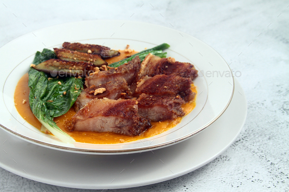 Freshly cooked Filipino food called Bagnet Kare Kare Stock Photo by ...