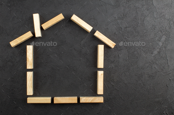 top view house shaped wood blocks on black background copy place Stock ...
