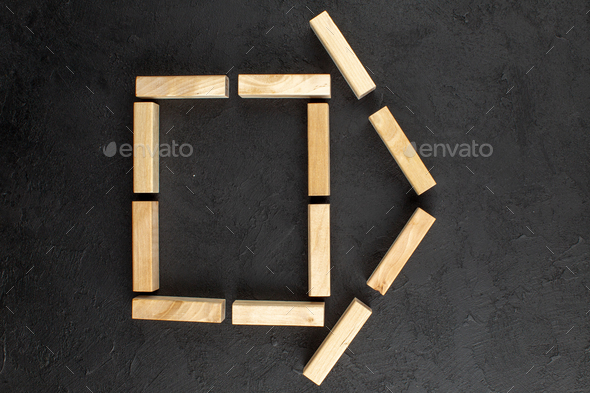 top view house shaped wood blocks on black background free space Stock ...