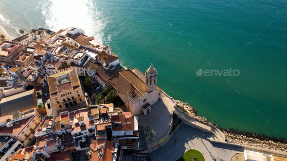 Aerial view of Sitges coastal village and Iglesia de San Bartolomé y ...