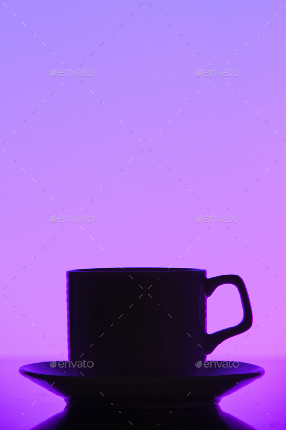 front view black tea cup in dark shadow on purple background color ...