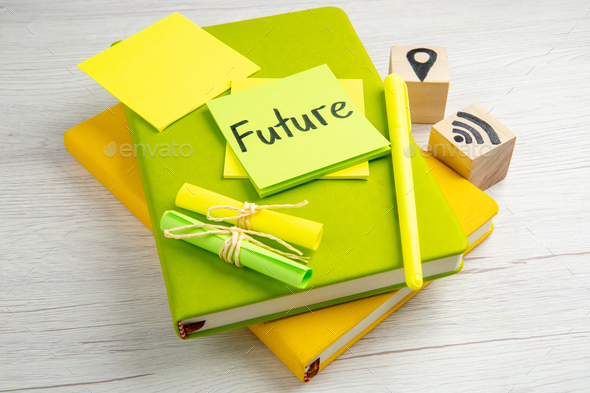 front view future note on sticker with copybooks on white background ...