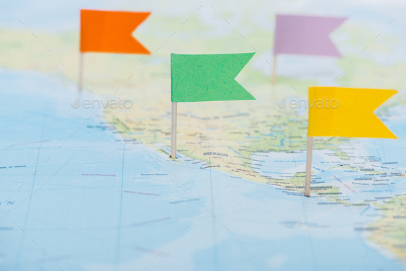 close up view of colorful flag pins on world map with copy space Stock ...