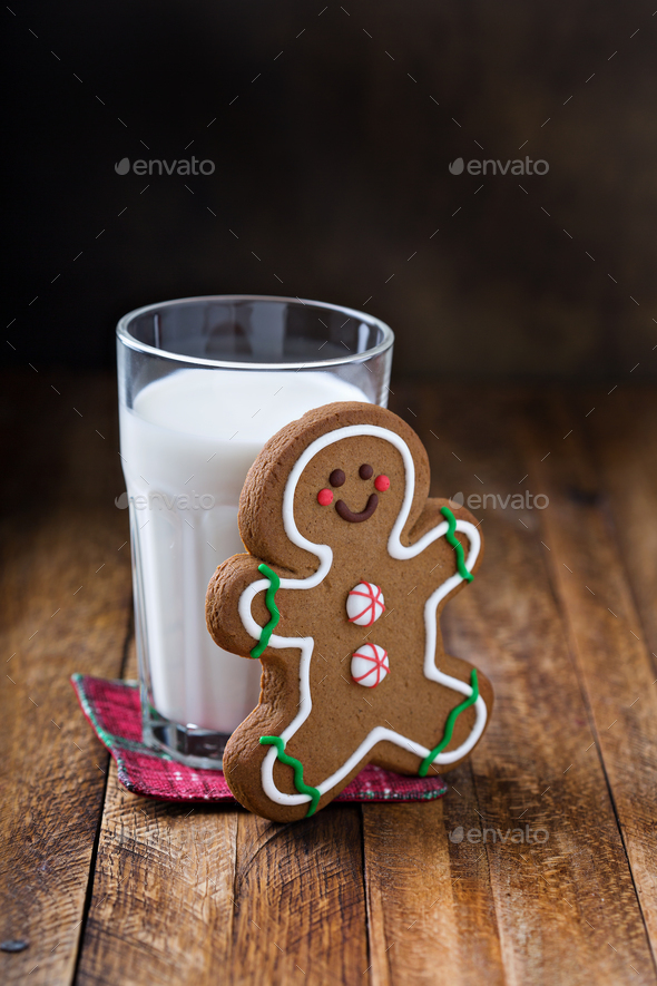 Gingerbread man cookie with a glass of milk Stock Photo by fahrwasser