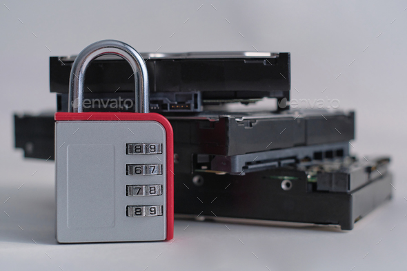 Encrypted hard disk. Padlock with cipher on an opened hard disk. Stock ...