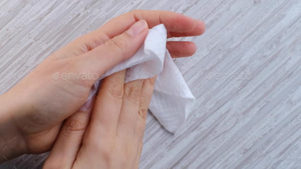 woman hands wiping using white alcohol tissue cleaning disinfection ...