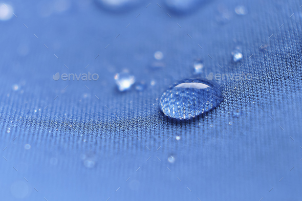 water beading on fabric. Waterproof coating background with water drops ...