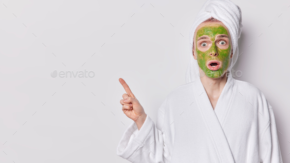 Horizontal shot of stunned young man feels very impressed poses with ...