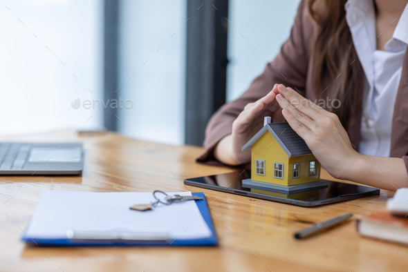 hands holding modern house key, family home, homeless shelter and real ...