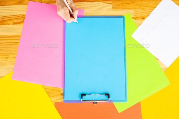 Office Hand Holding a Folder with a Blue Color Paper Stock Photo by ...