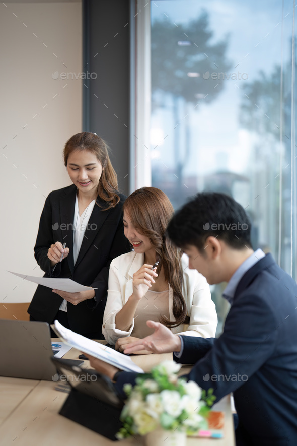 Group of young asian creative business brainstorm meeting presentation ...