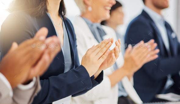 Happy businesswoman clapping hands for presentation during a meeting in ...