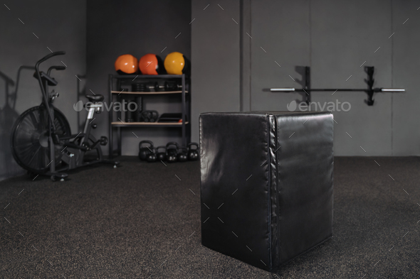 Jumping box and other equipment for crossfit at empty gym Stock Photo ...