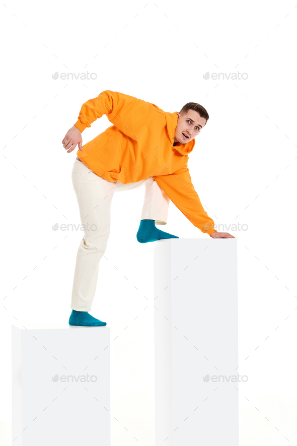 man rising up the career ladder. guy following up on white diagram ...