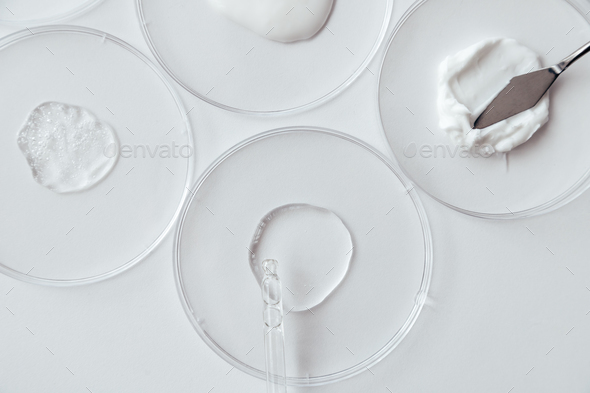 Cosmetics Samples in Laboratory Glassware on white background ...