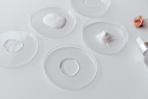 Cosmetics Samples in Laboratory Glassware on white background ...