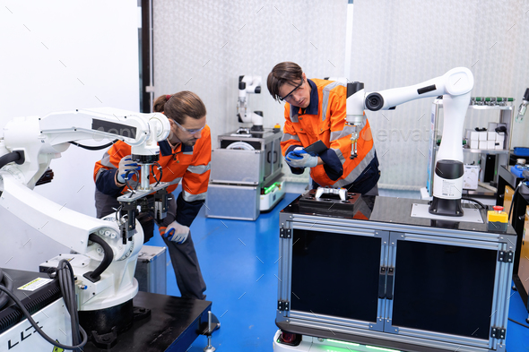 Engineer service robot welding in factory software programming ...