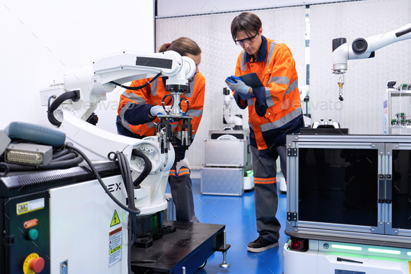 Engineer service robot welding in factory software programming ...