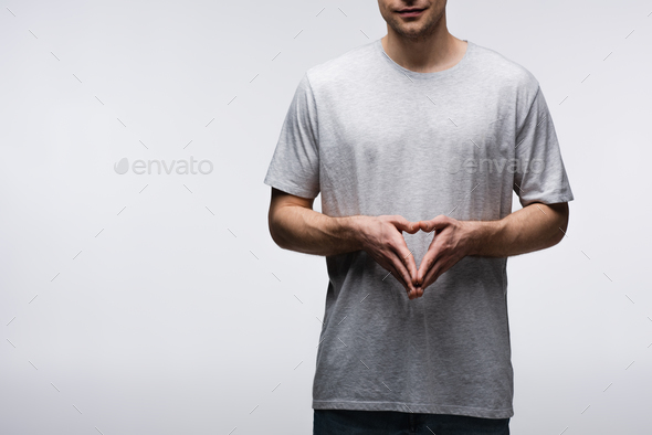 partial view of man showing steeple gesture while using body language ...